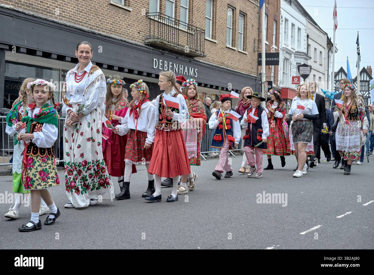 Polish people in traditional costume, parade through the street at the ...