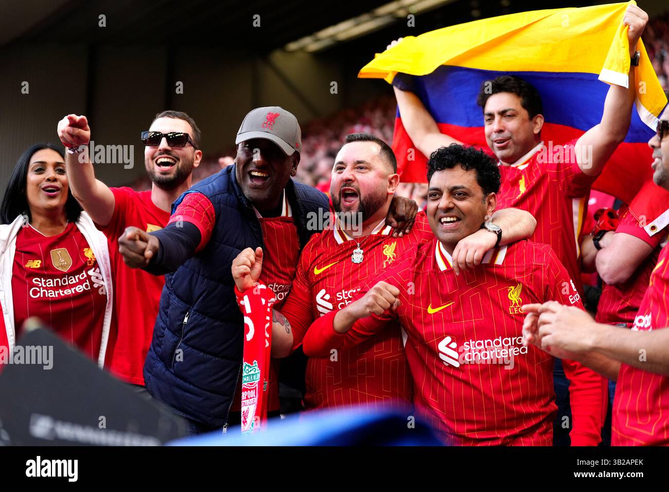 Liverpool fans celebrate during the Premier League match at Anfield ...