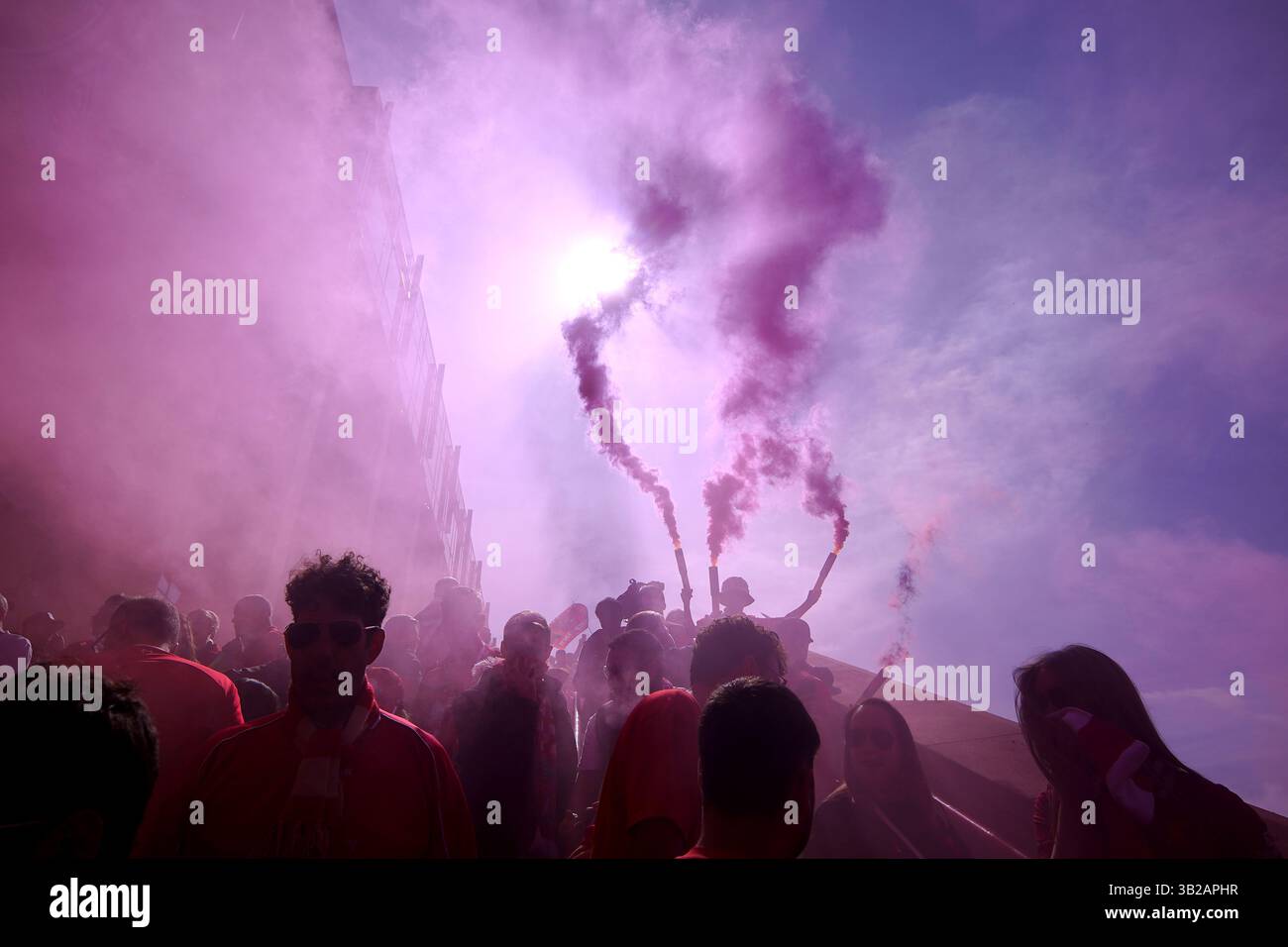 Liverpool fans set off flares outside the stadium ahead of the Premier ...