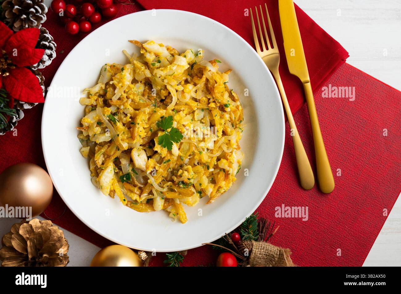 Cod o bras, golden cod with potatoes, a traditional Portuguese dish ...