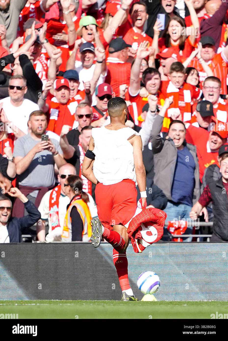 Liverpool's Cody Gakpo celebrates scoring their side's third goal of ...