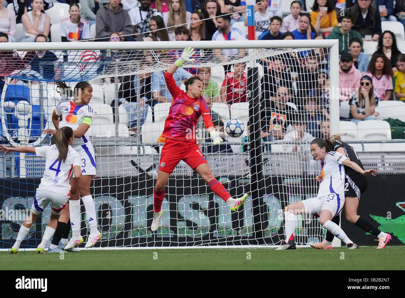 Lyon goalkeeper Christiane Endler deflects the ball into her own goal ...