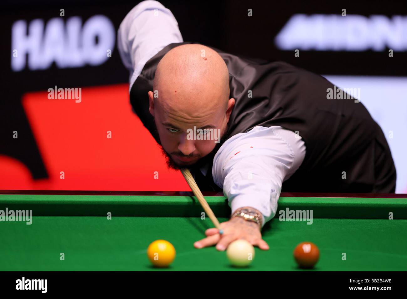 Luca Brecel during his match against Ding Junhui (not pictured) during ...