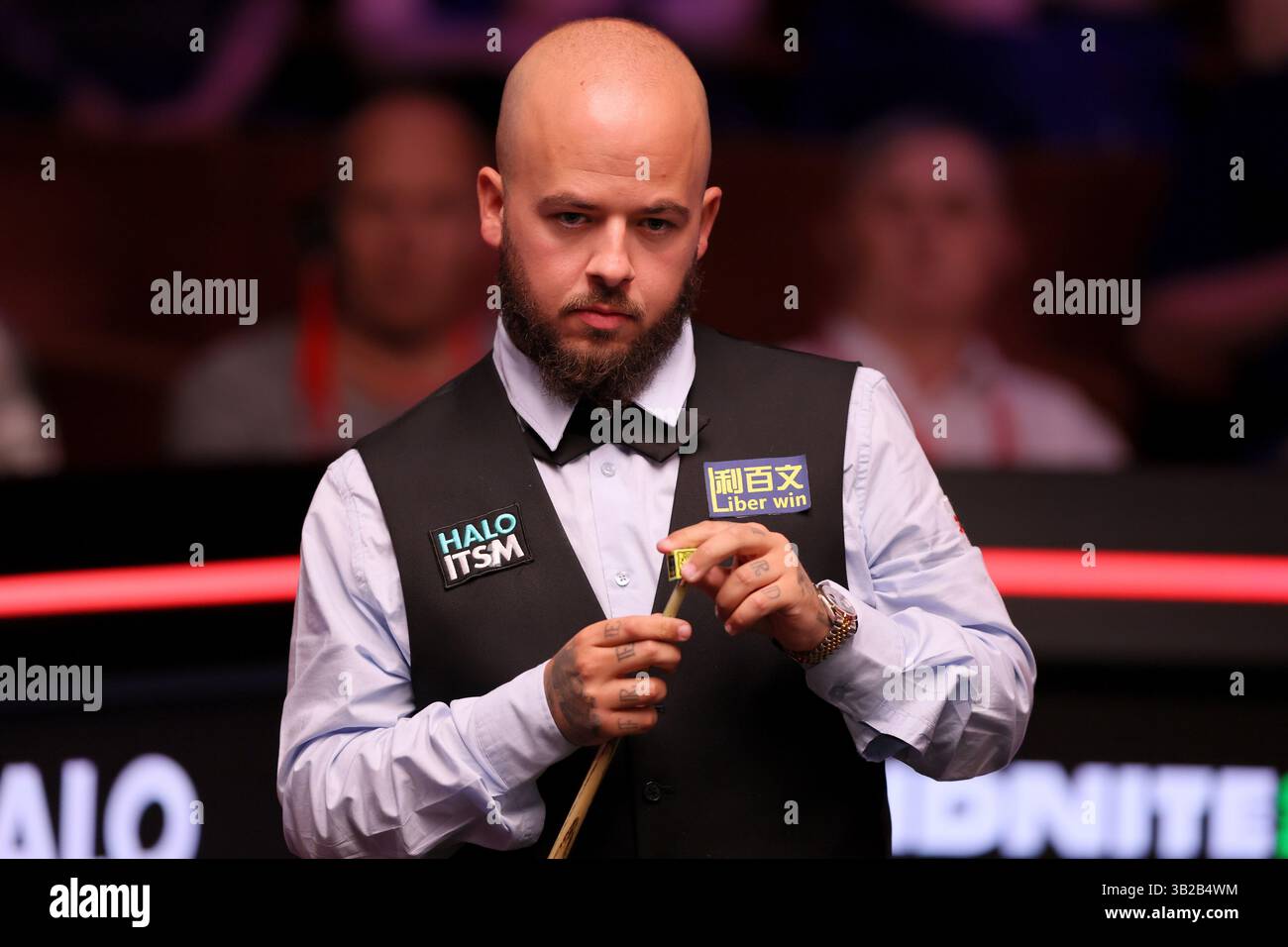 Luca Brecel during his match against Ding Junhui (not pictured) during ...