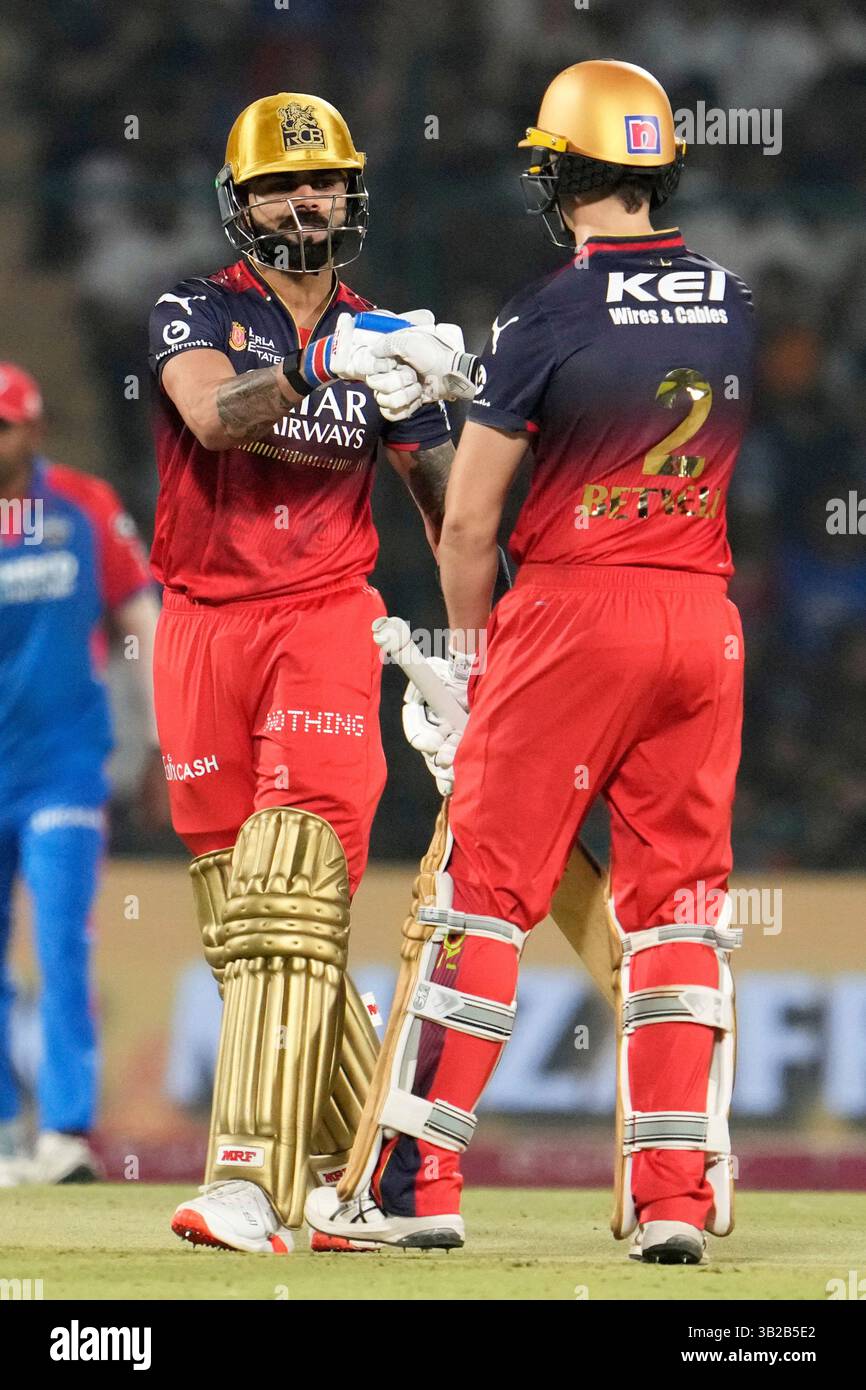 Royal Challengers Bengaluru's Virat Kohli, left, and batting partner ...
