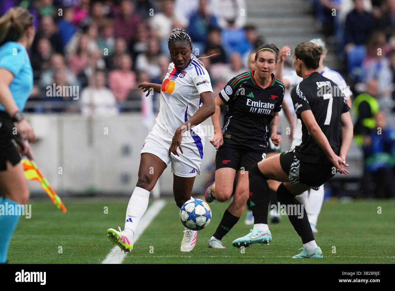 Lyon's Kadidiatou Diani, left, runs with the ball during the women's ...
