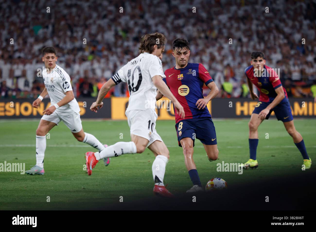 SEVILLE, SPAIN - APRIL 26, 2025: Luka Modric and Pedri Gonzalez during ...
