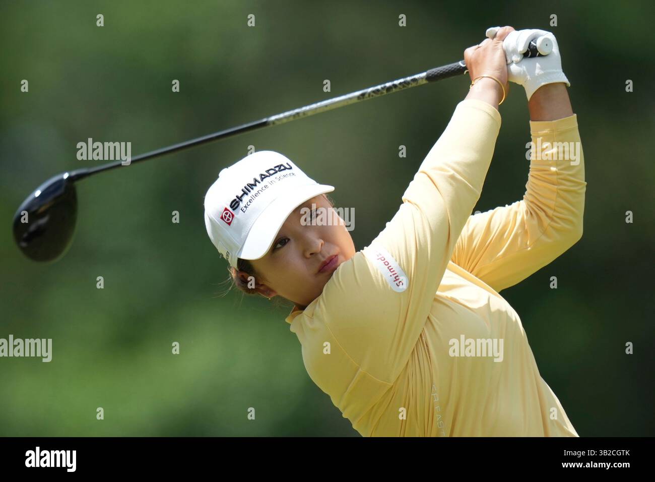 Mao Saigo, of Japan, hits from the second tee during the final round of ...