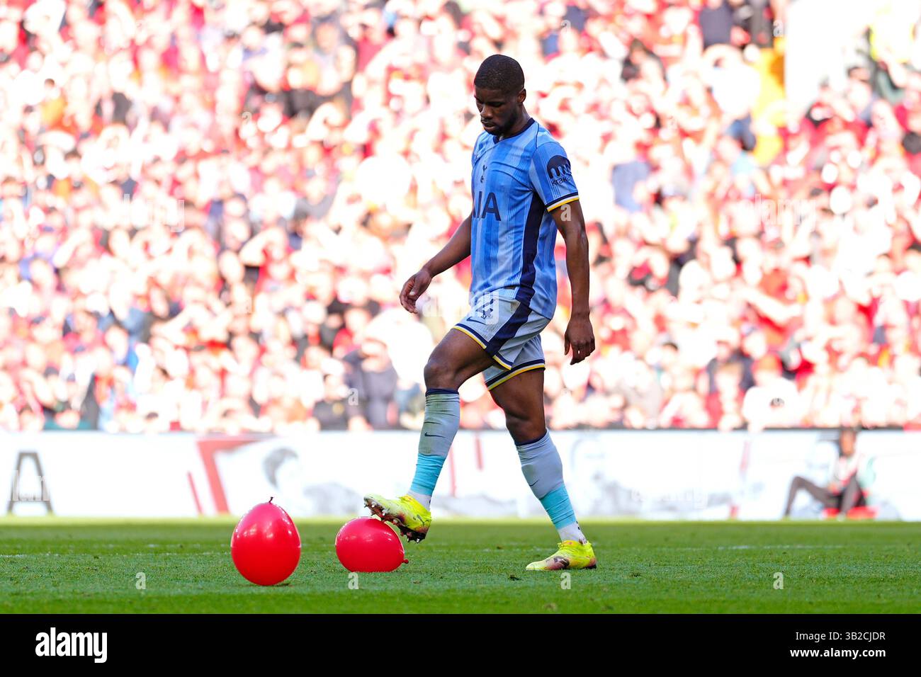 Tottenham Hotspur's Kevin Danso pops a balloon with his boot during the ...