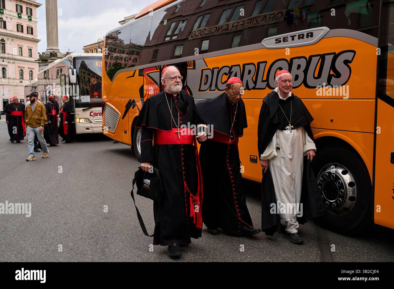 From left, Cardinals Sean Patrick O'Malley, Oswald Gracias, and Edoardo Menichelli walk outside ...
