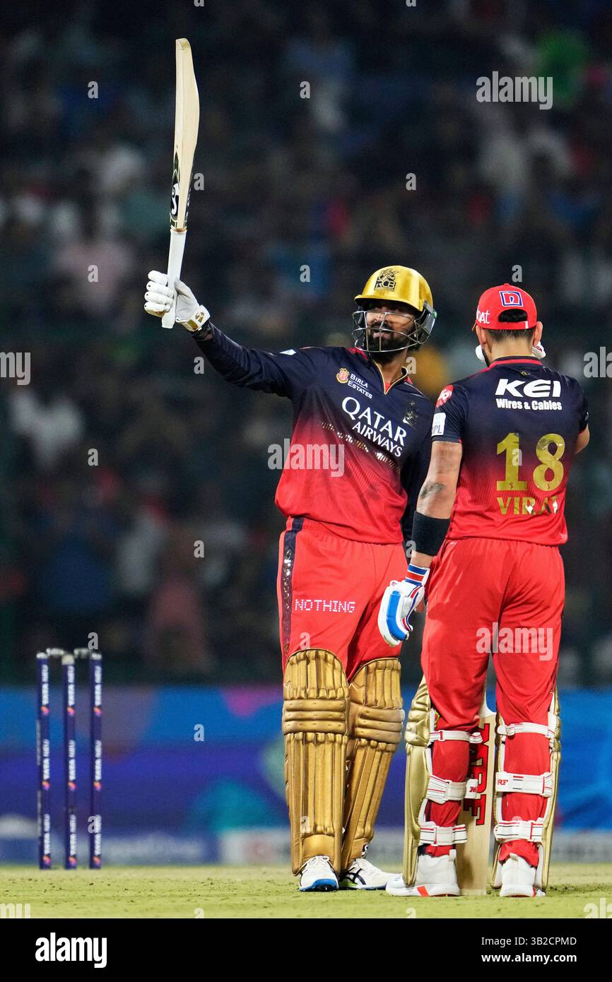 Royal Challengers Bengaluru's Krunal Pandya, left, celebrates after ...