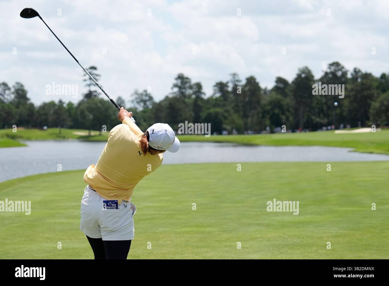 Mao Saigo, of Japan, hits from the fourth tee during the final round of ...
