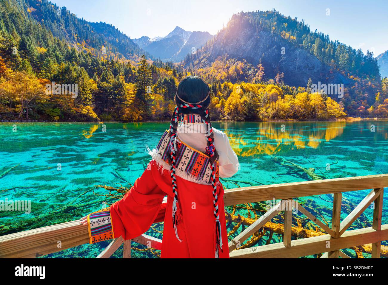 Tourist wearing traditional clothes at jiuzhaigou national park in ...