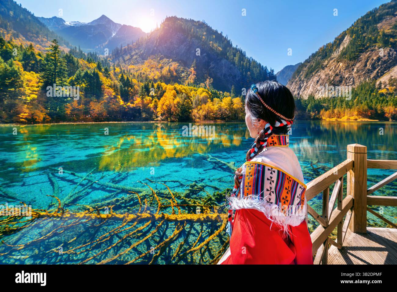 Tourist wearing traditional clothes at jiuzhaigou national park in ...