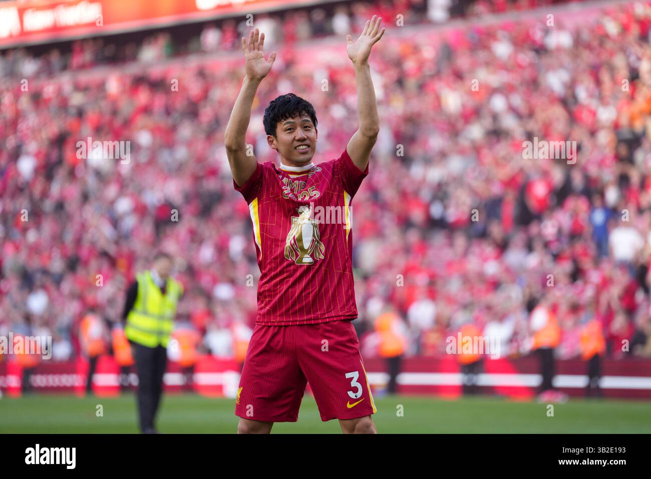 Liverpool's Wataru Endo celebrates after winning the English Premier ...