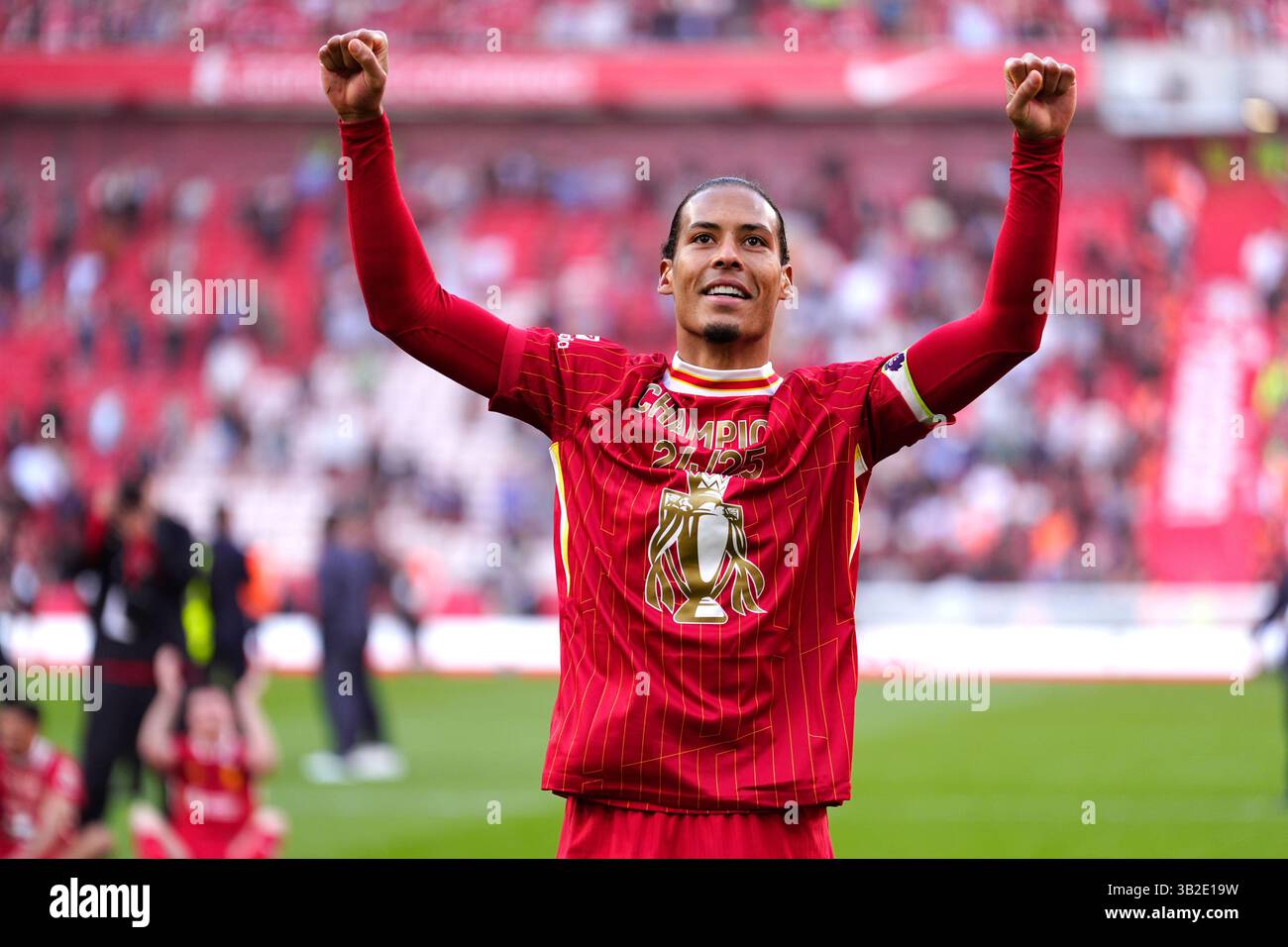 Liverpool's Virgil van Dijk celebrates victory and the Premier League ...