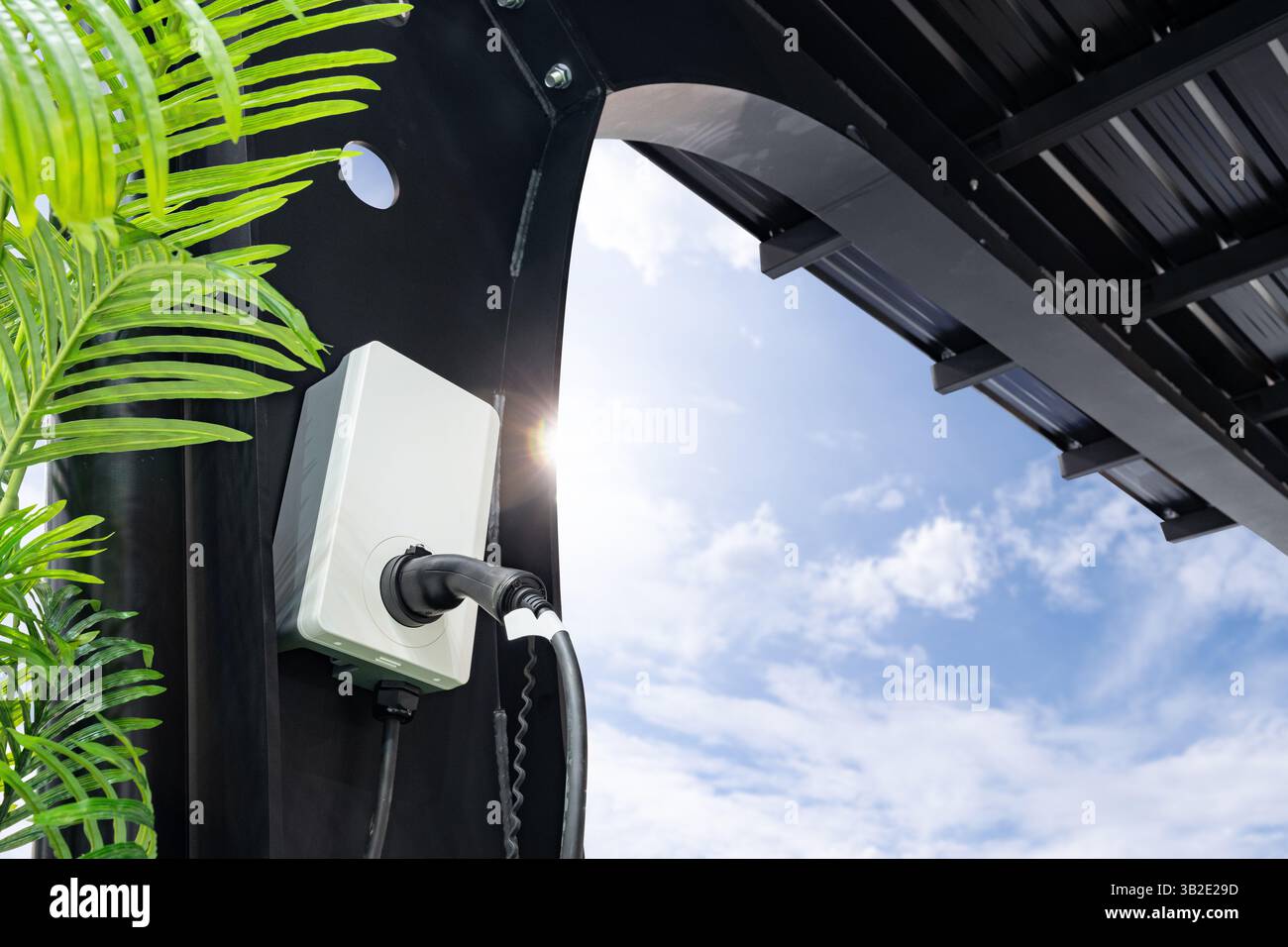 Electric vehicles charging station that takes energy from solar canopy ...