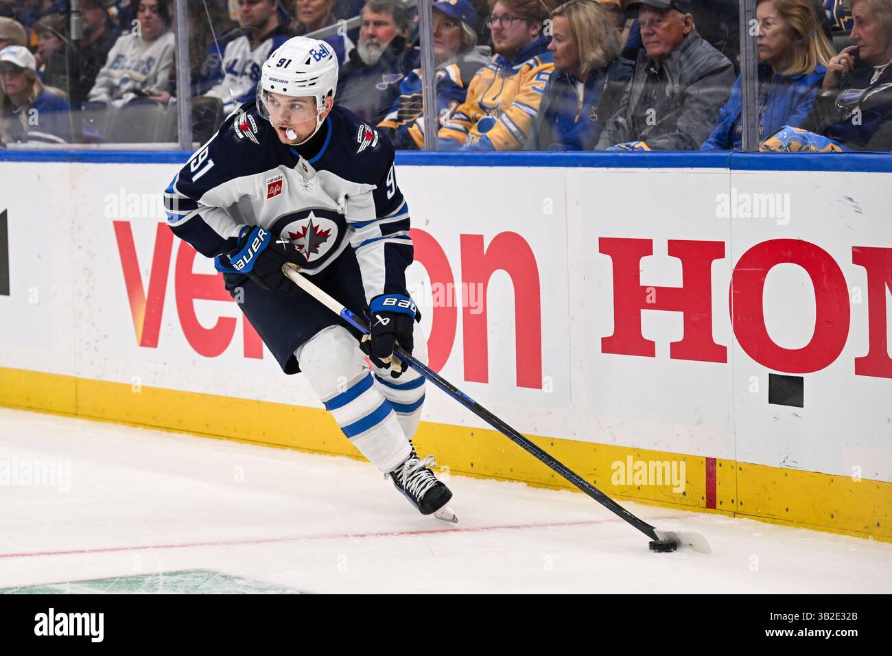 Winnipeg Jeyts' Cole Perfetti skates with the puck during the first ...