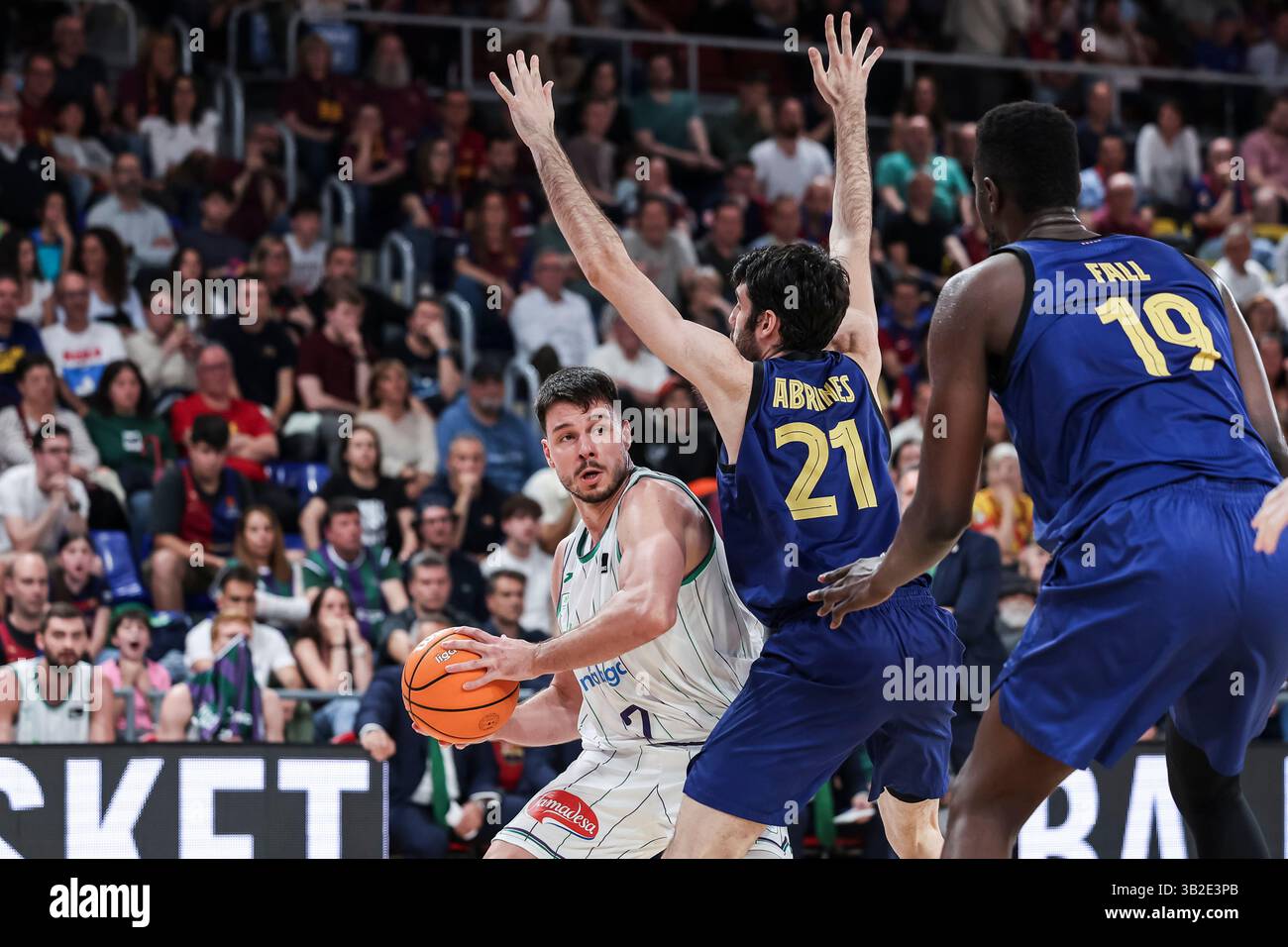 Jonathan Barreiro of Unicaja and Alex Abrines of FC Barcelona in action ...