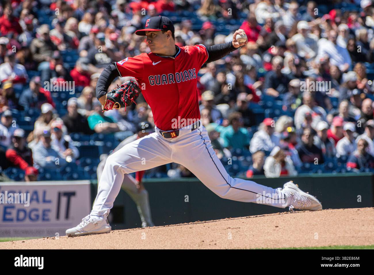 Cleveland Guardians starting pitcher Logan Allen delivers against the ...