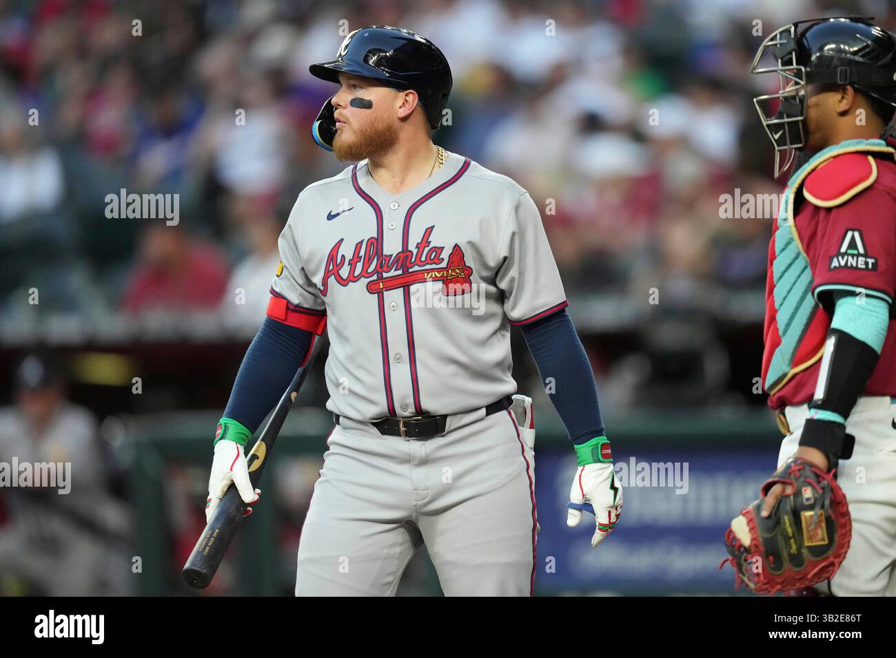 Atlanta Braves' Alex Verdugo, left, and Arizona Diamondbacks catcher ...