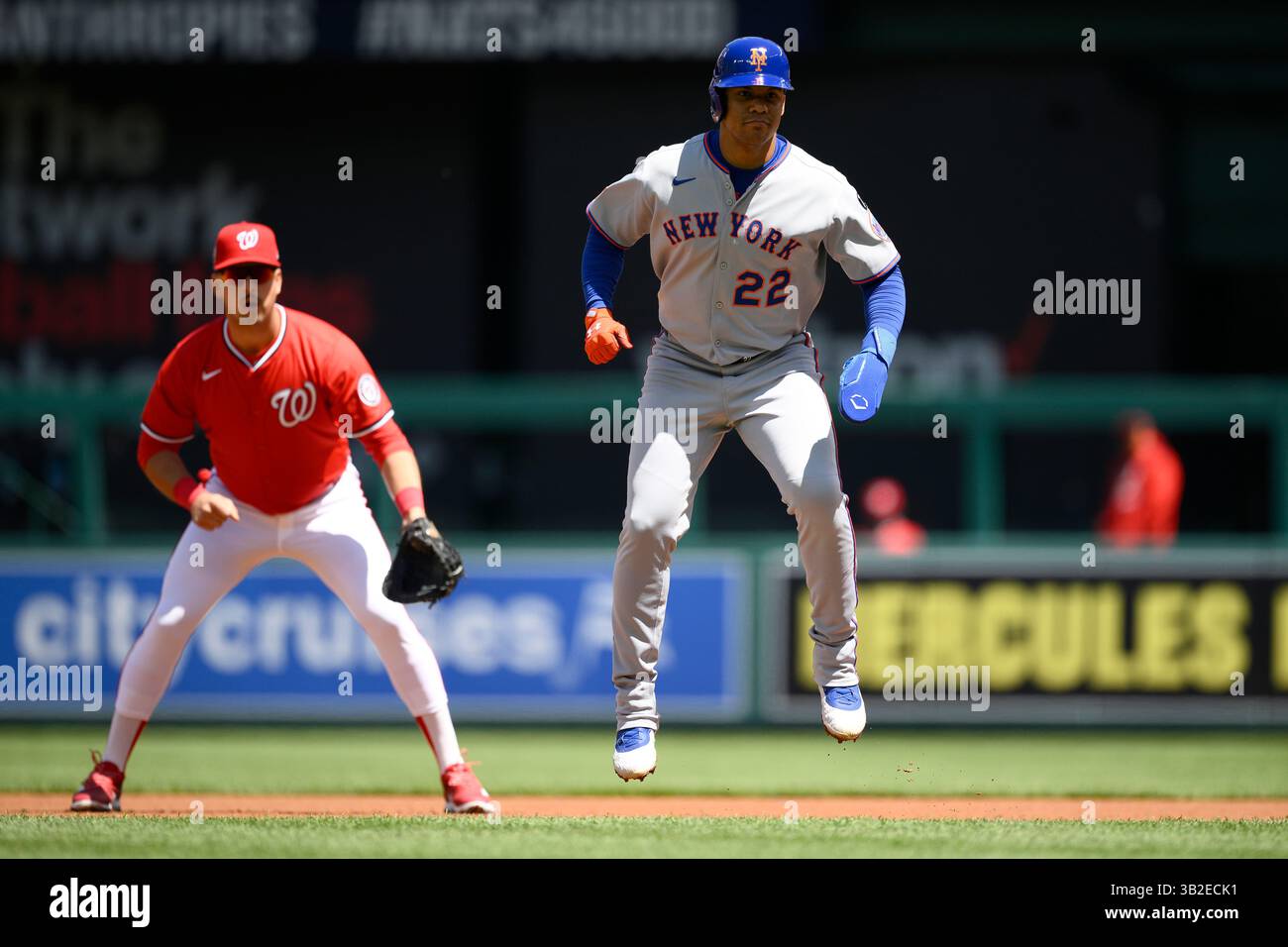 New York Mets' Juan Soto (22) takes a lead from first base in front of ...