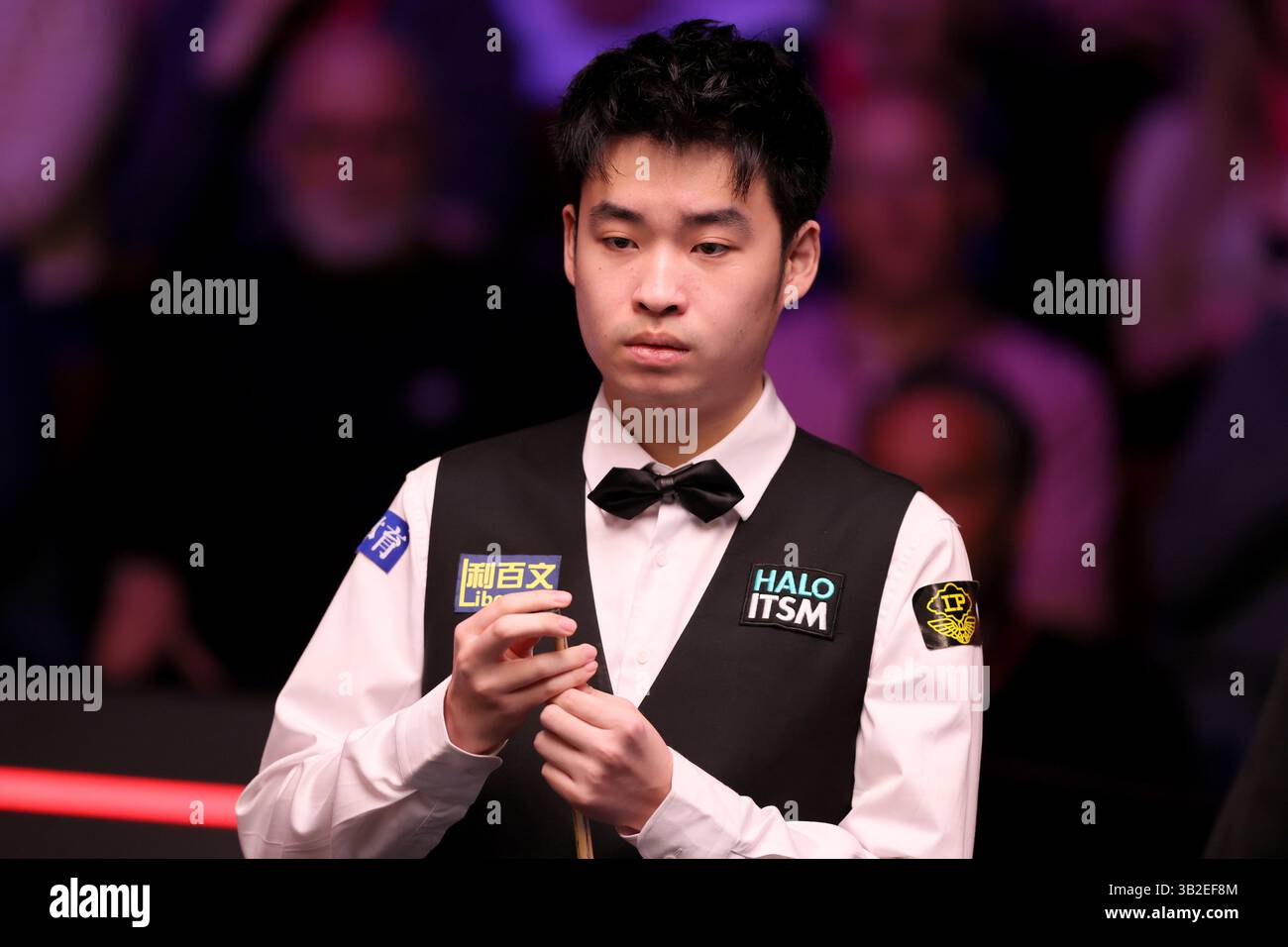 Si Jiahui during his match against Ben Woolaston (not pictured) during day nine of the Halo ...