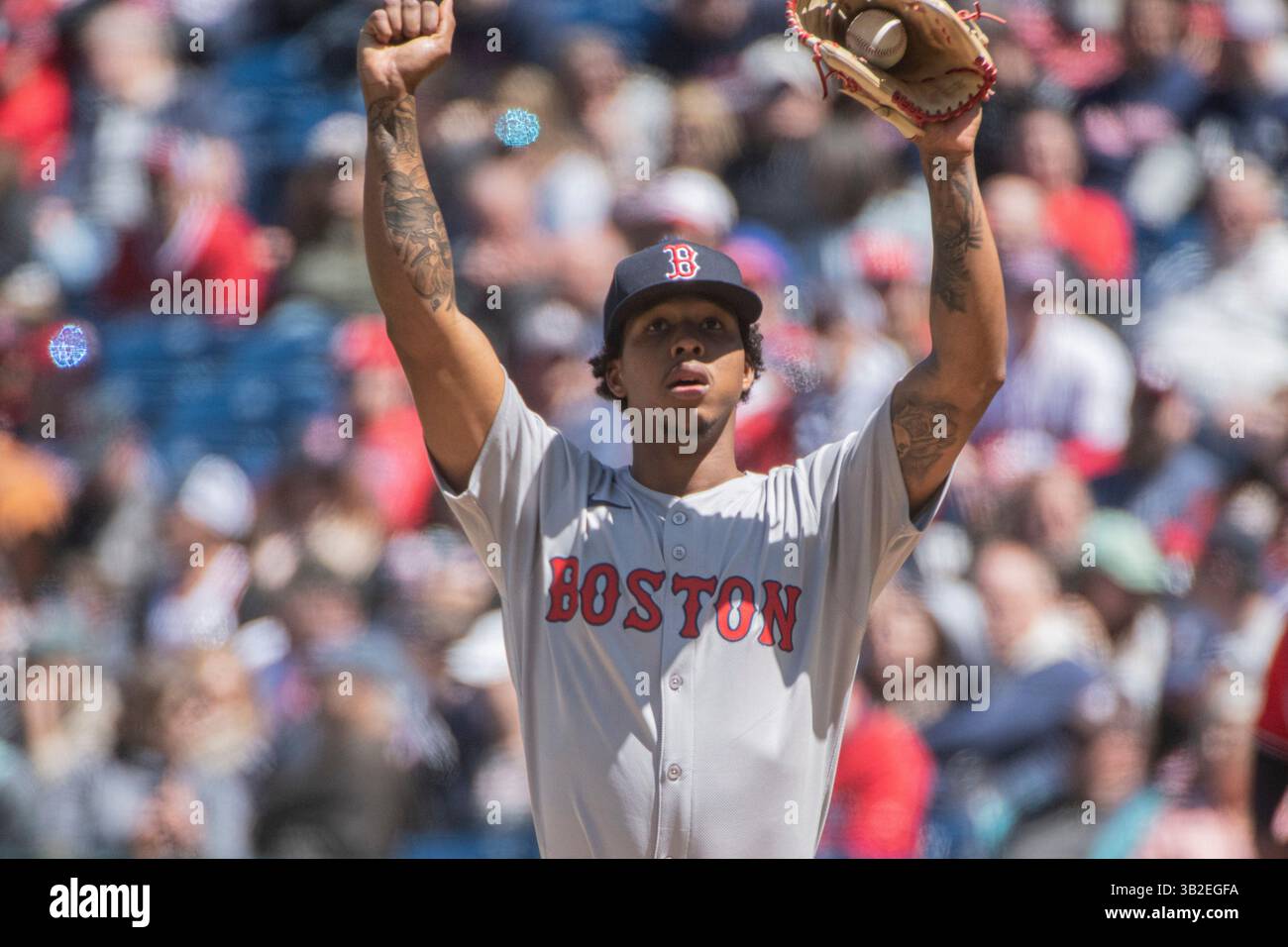 Boston Red Sox starting pitcher Brayan Bello pauses before he delivers ...