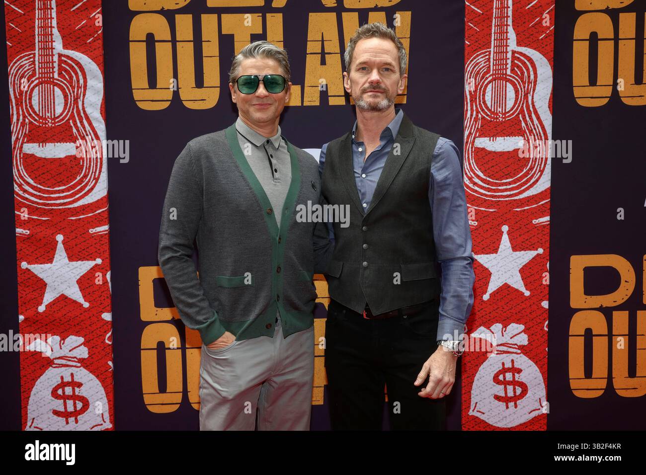 Actors David Burtka, left, and Neil Patrick Harris attend the "Dead ...
