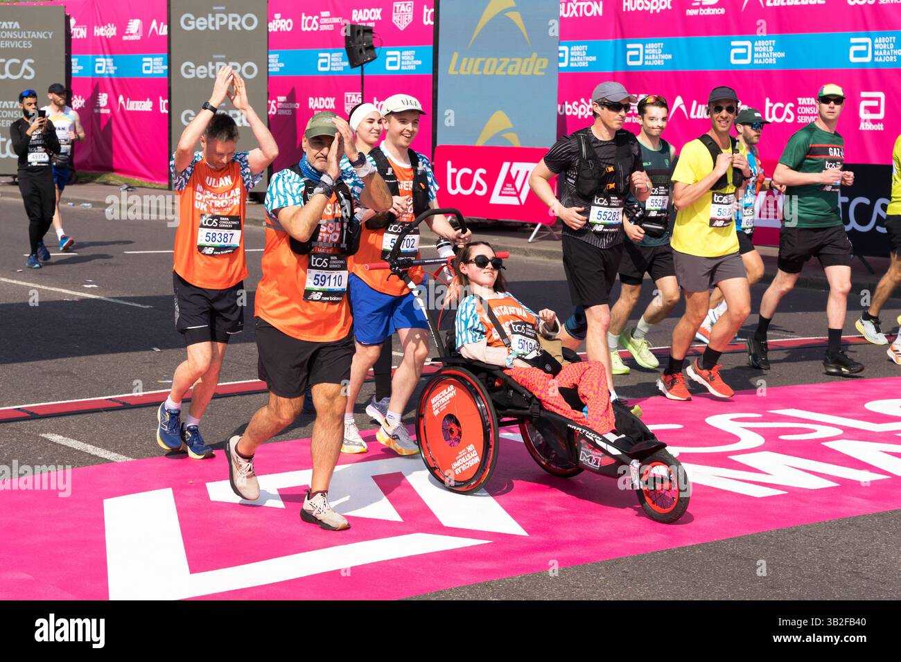 London , UK. 27th April 2025. TCS marathon Runners passing the starting ...