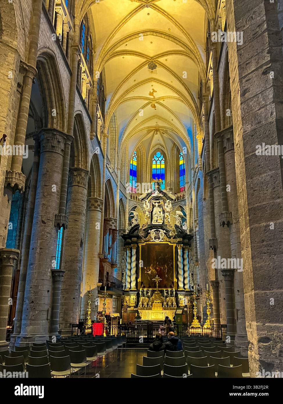 Beautiful Church Interior Featuring Stained Glass Windows and an Ornate ...