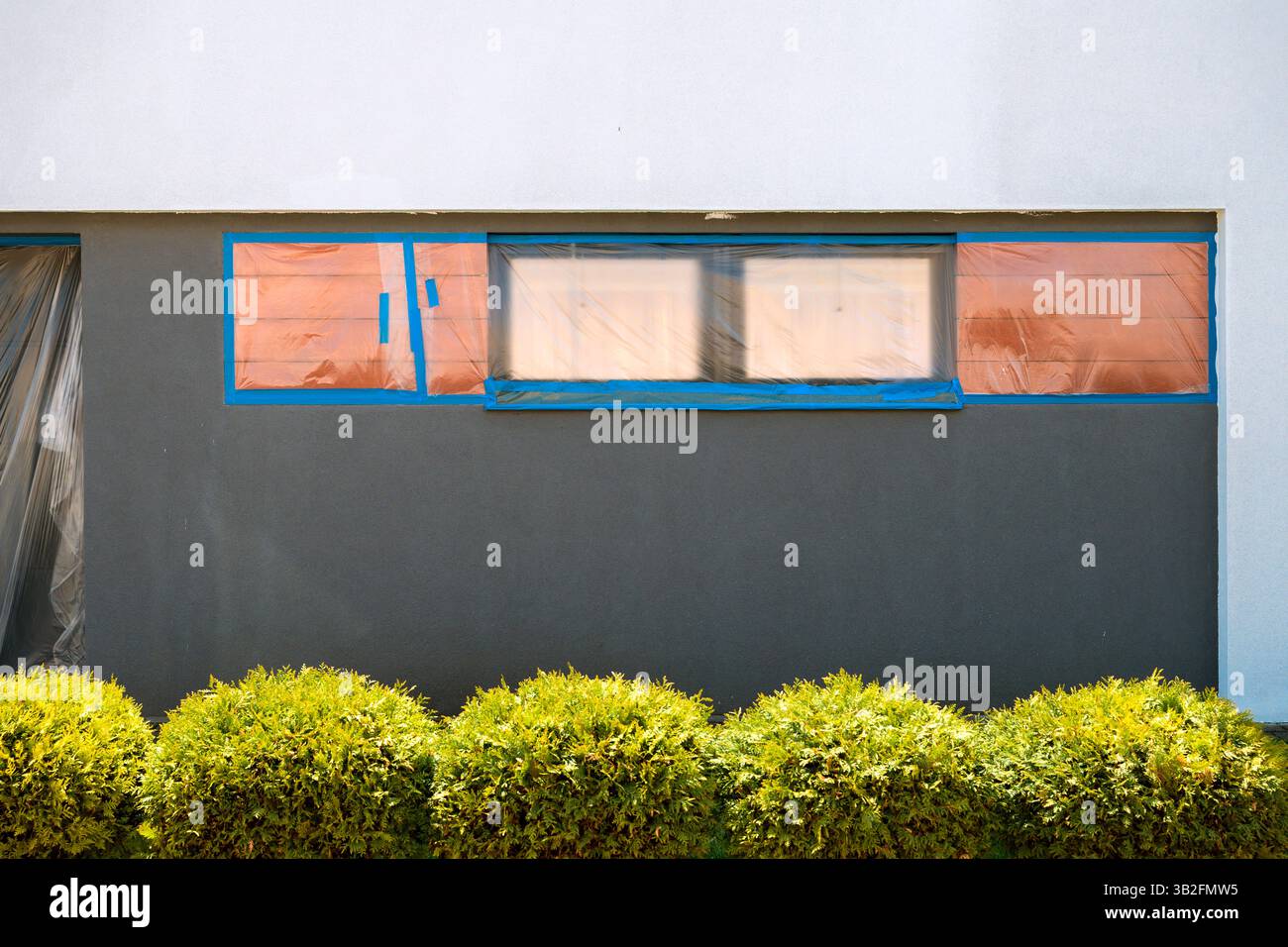 House renovation, protected doors and windows for building repainting ...