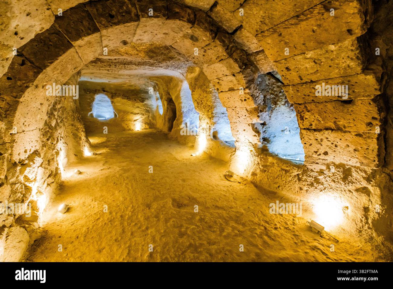 interior of an ancient underground cave city, arched vault Stock Photo ...