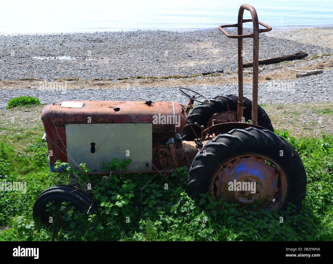 Lytham St Annes, UK, 27th April, 2025. Abandoned, rusty, old tractor on the beach in Lytham ...