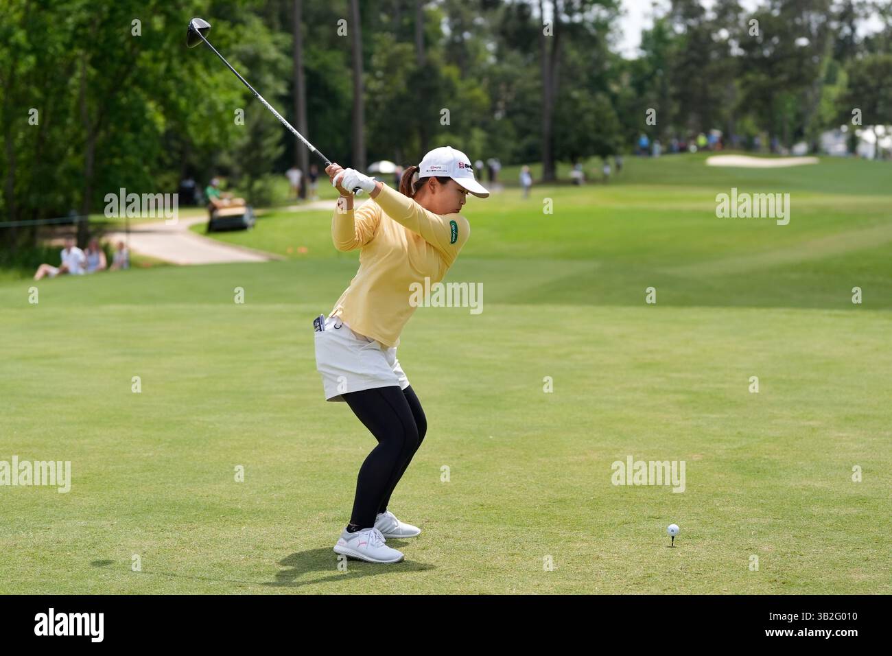 Mao Saigo, of Japan, hits from the nineth tee during the final round of ...