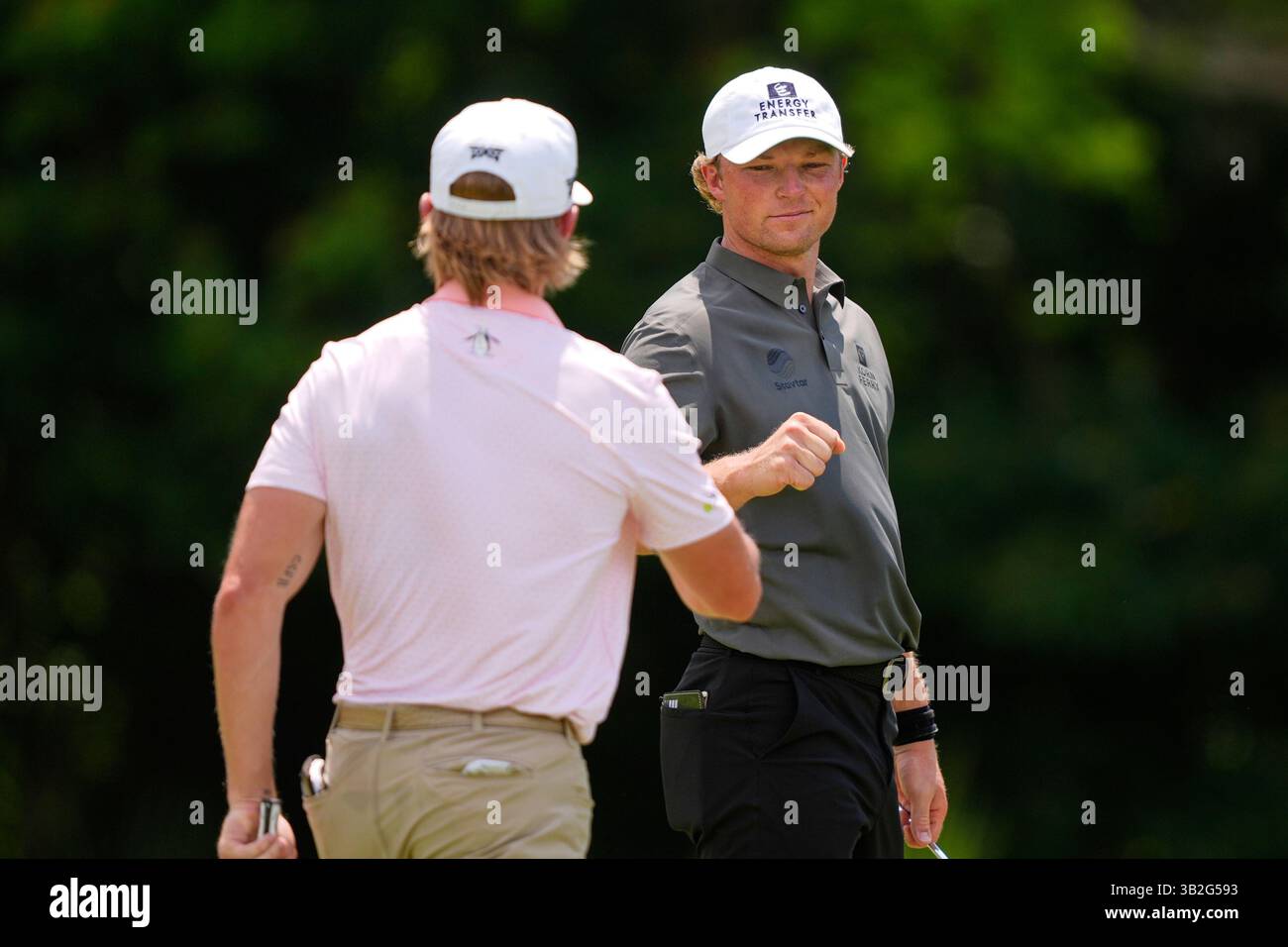 Frankie Capan III, facing greets teammate Jake Knapp after birdying the ...