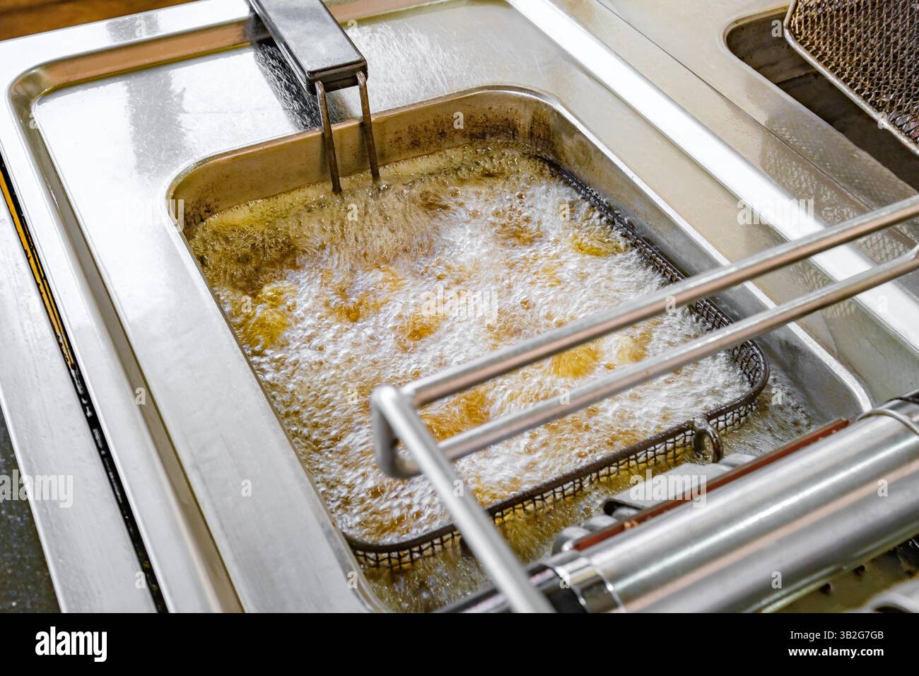 Deep fryer basket french hi-res stock photography and images - Alamy