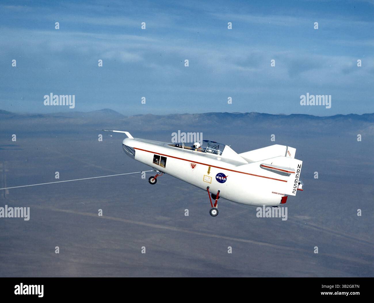 NASA M2-F1 Lifting Body in first flight being towed by a C-47. The NASA ...