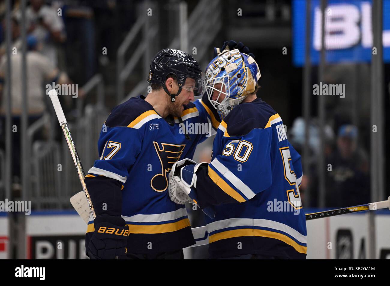 St. Louis Blues' Cam Fowler (17) and Jordan Binnington (50) celebrate ...