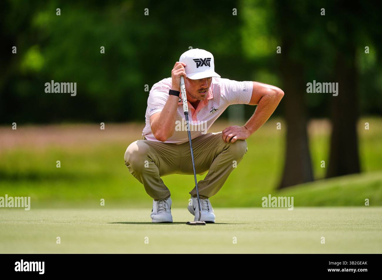 Jake Knapp lines up a shot on the second green during the final round ...