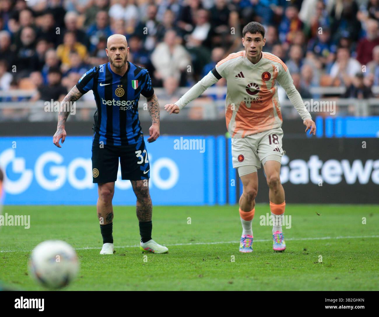 Milan, Italy. 27th Apr, 2025. Federico Dimarco of Inter FC and Matias Soule of AS Roma during ...