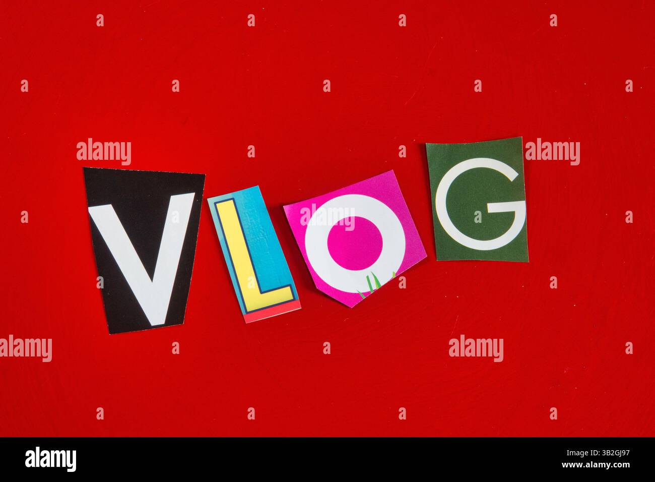 The Word "Vlog" using cut-out paper letters in the ransom note effect ...