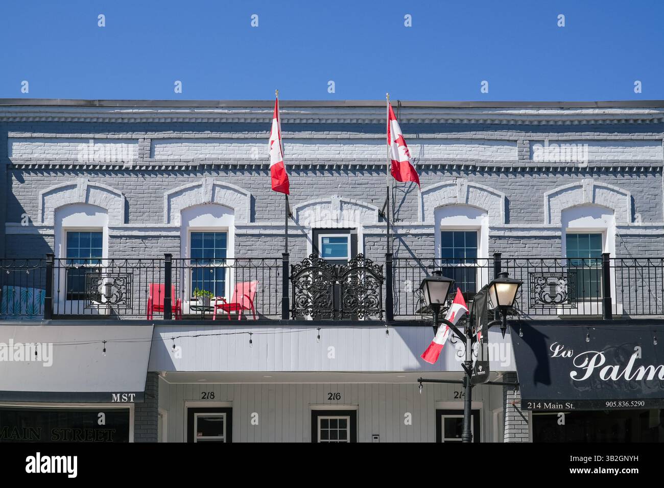 Newmarket, Ontario features a two-story grey brick building with ...