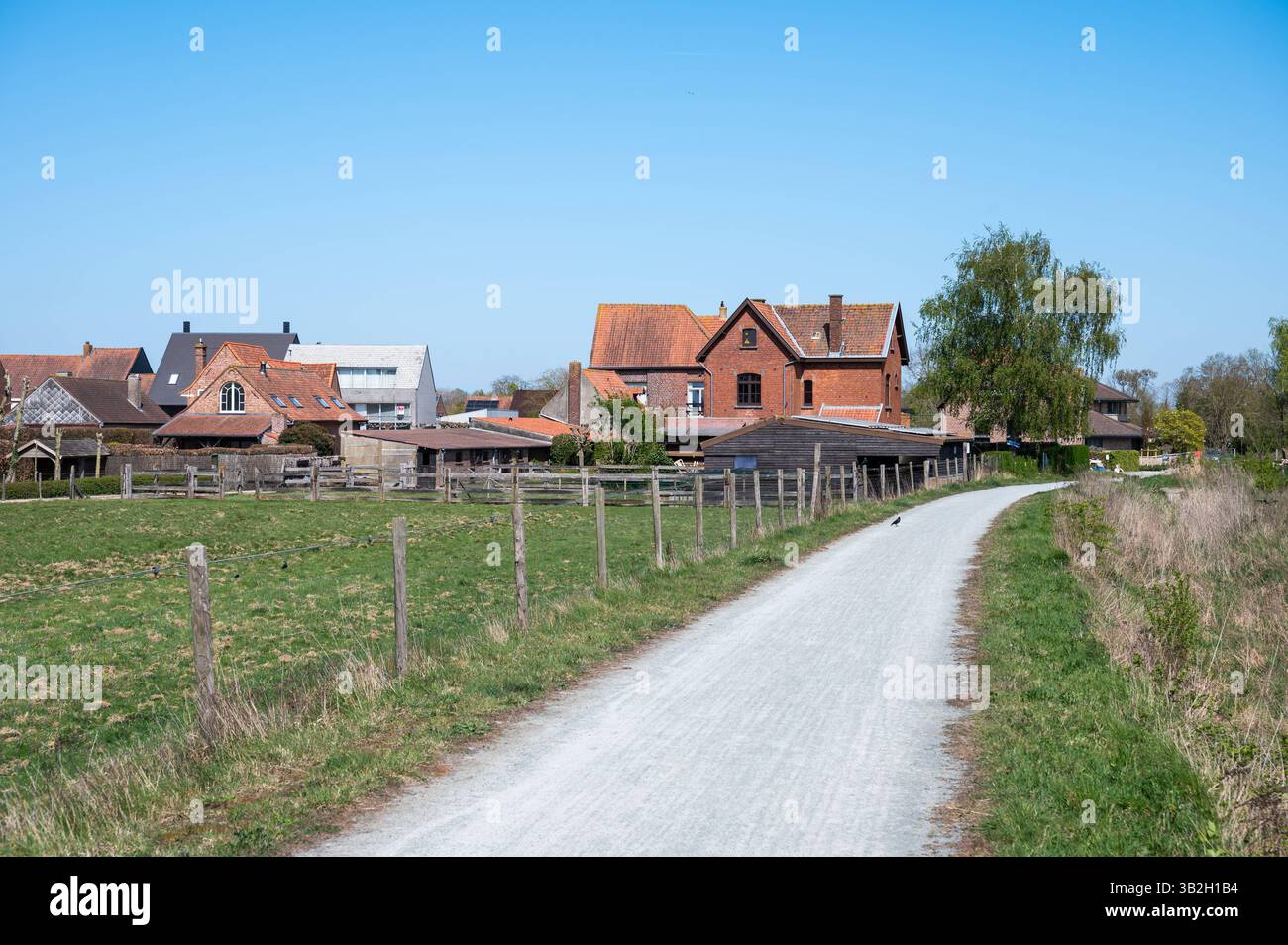 Colorful agriculture fields and stables of local farms in Elverdinge ...