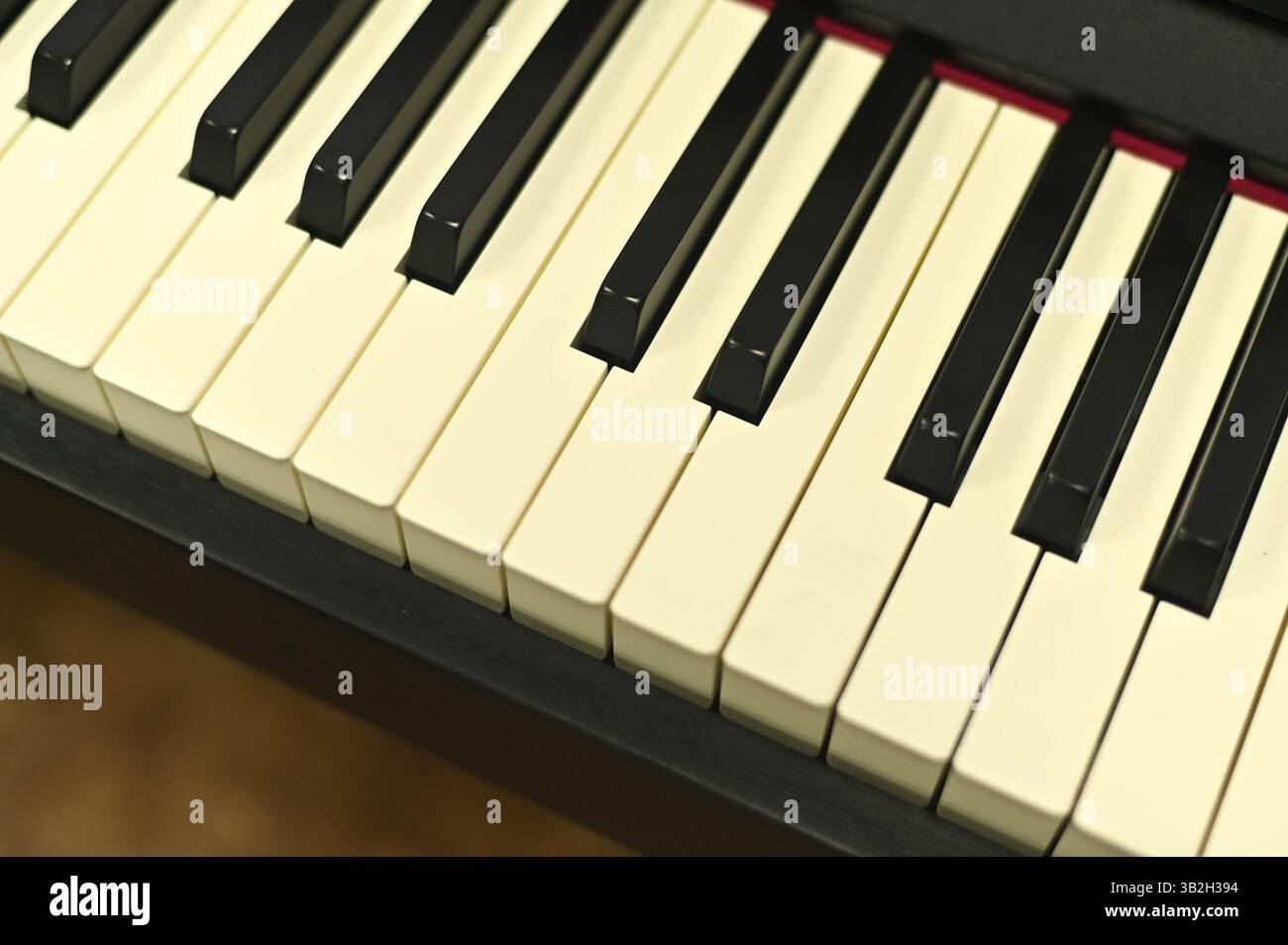 Minimalist electronic piano keyboard with clean lines and modern design ...