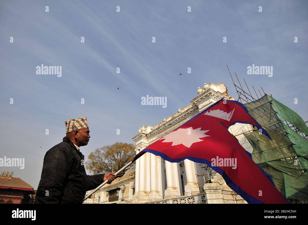 Jan. 1, 2016 - Kathmandu, NP, Nepal - An old man weaving National Flag ...