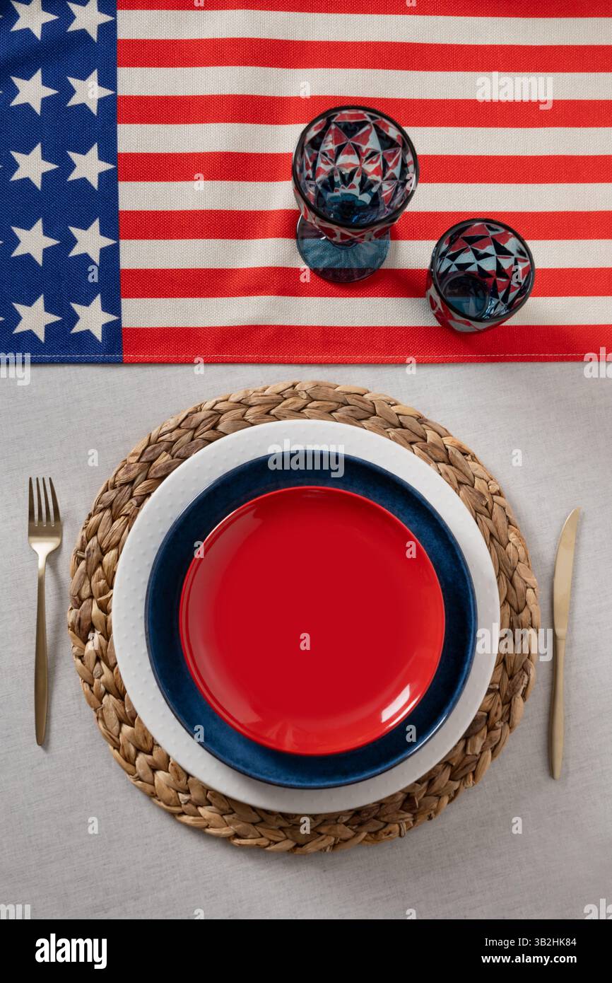Table setting for USA Independence Day. Festive dinner with empty plate ...