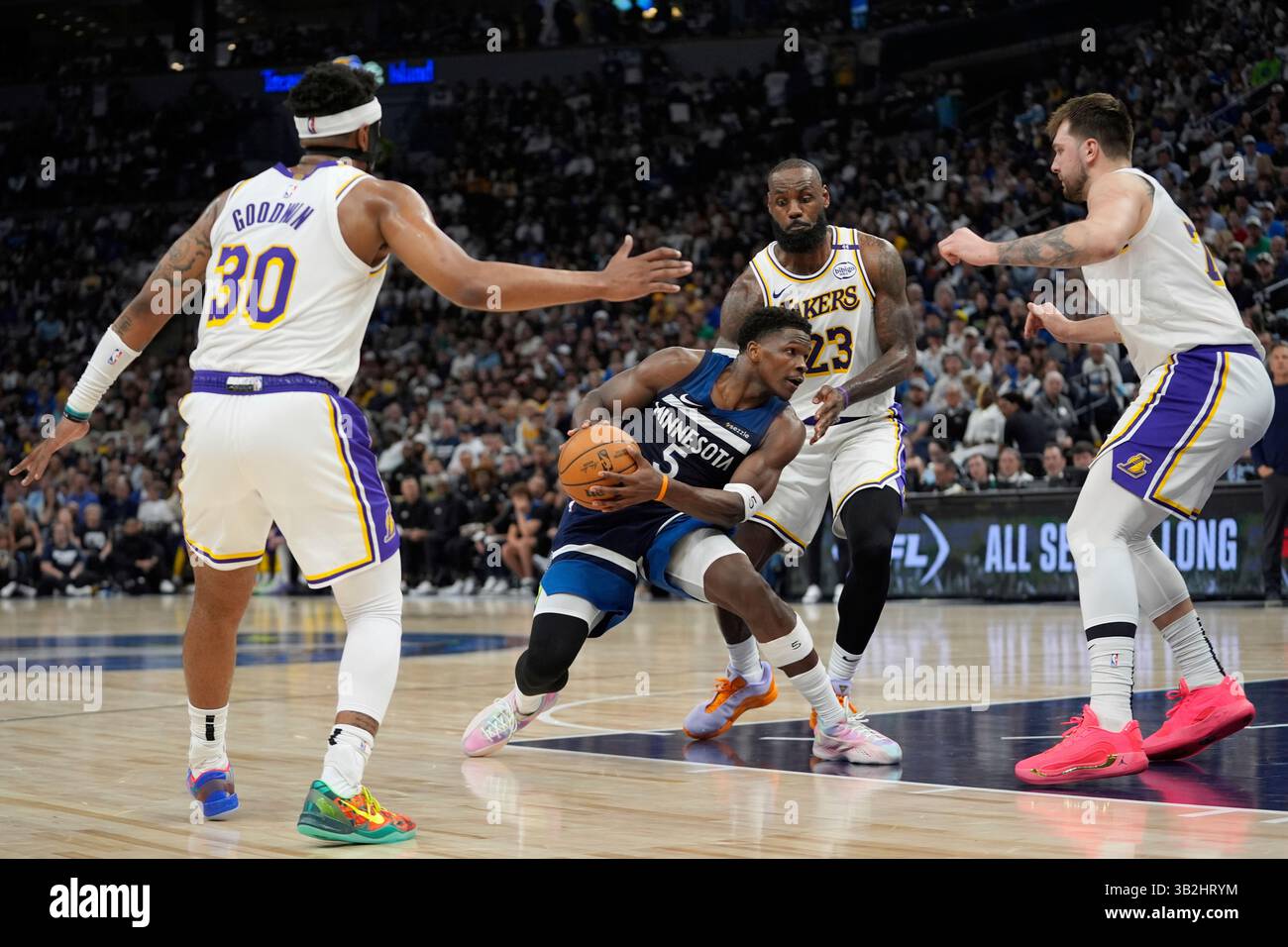 Minnesota Timberwolves guard Anthony Edwards (5) works toward the ...