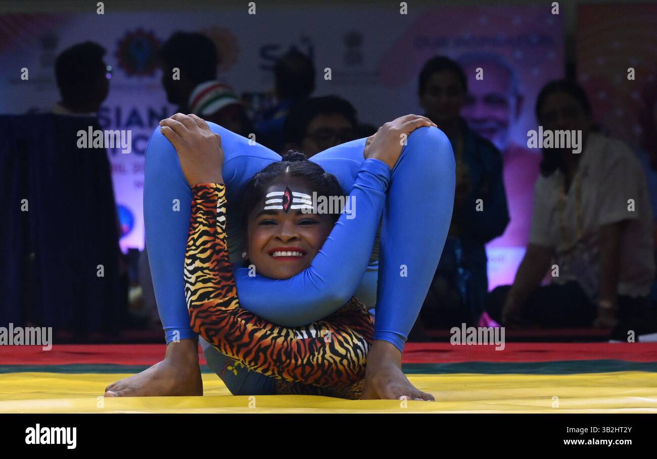 NEW DELHI, INDIA - APRIL 26: Participants perform yoga during the 2nd ...