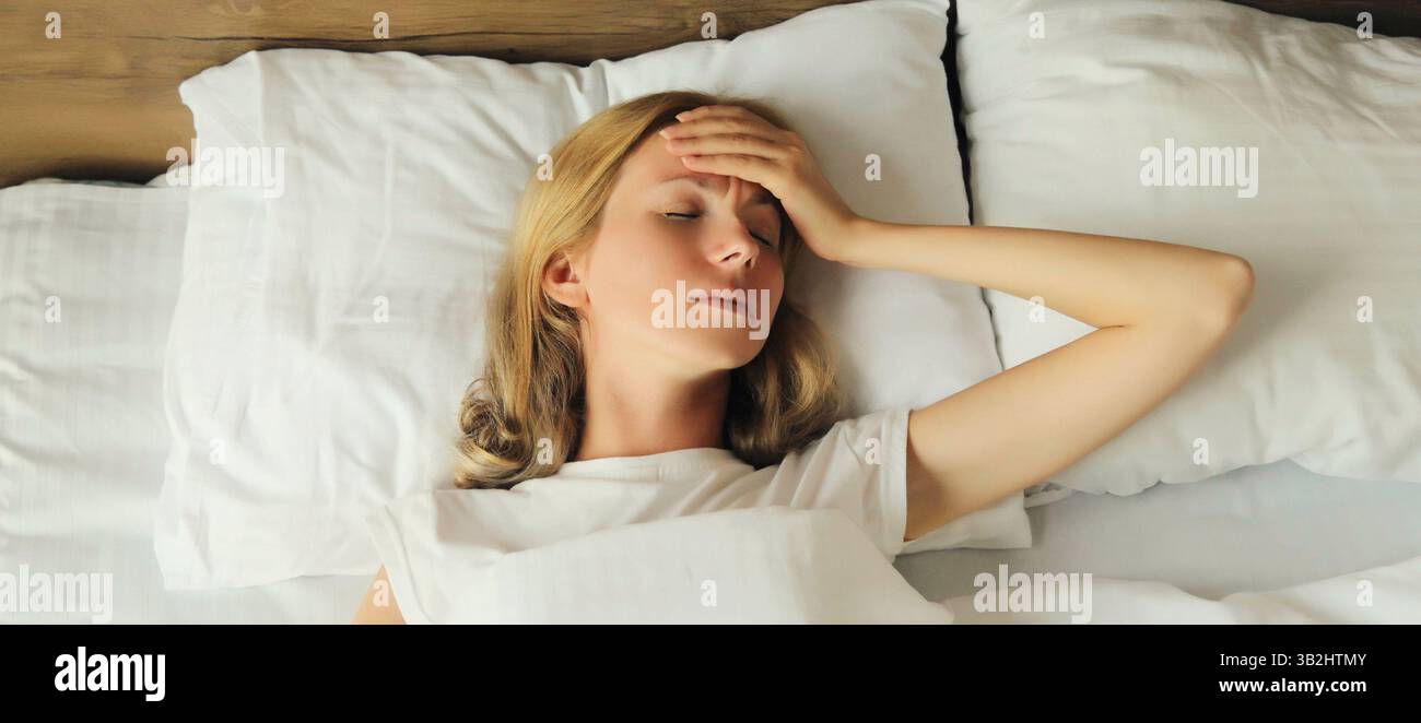 Exhausted tired woman touching head, suffering from headache, stress ...